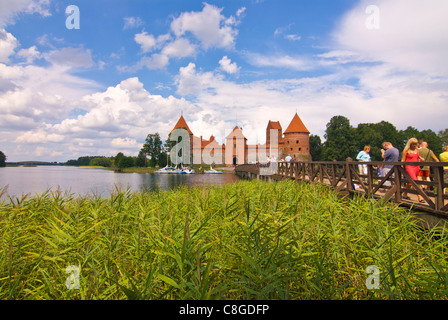 The Trakai Island Castle in Lithuania surrounded by the lake against ...