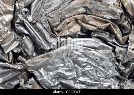 Scrap metal compressed into cubes, recycling yard Stock Photo - Alamy
