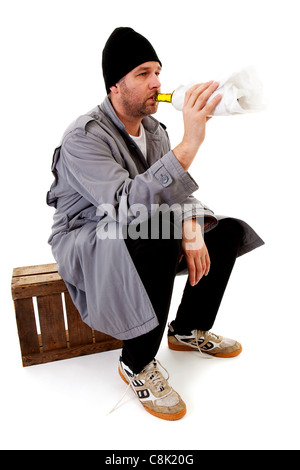 male homeless tramp with empty bottle over white background Stock Photo ...