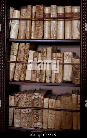 Medieval bookshelf with old books in the Old Royal Palace - Prague ...