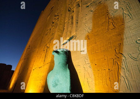 The statue of Horus of Behdet at sunset in the forecourt at the ...