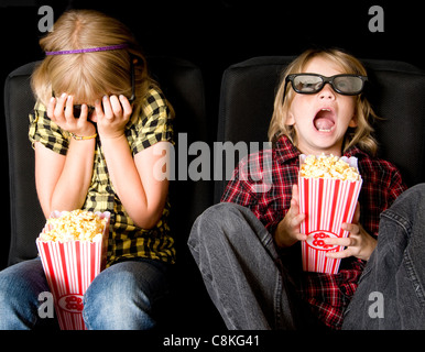 Kids watching scary movie Stock Photo - Alamy