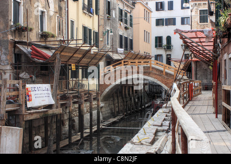 Dry canal dredging maintenance of Venice canals Stock Photo - Alamy