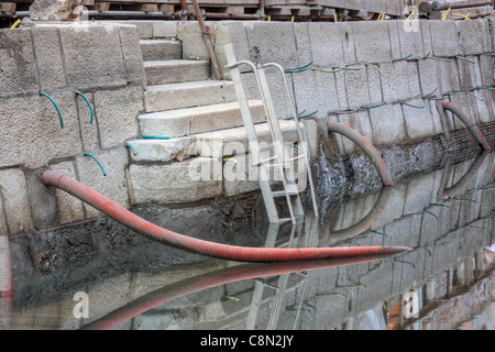 Dry canal dredging maintenance of Venice canals Stock Photo - Alamy