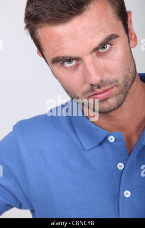 Offended man looking angry at you, cross arms on chest and stare mad ...