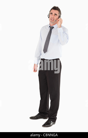 Office worker using a headset Stock Photo - Alamy