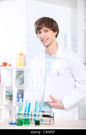 Experiment, research in progress. Chemist woman or student girl ...