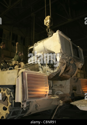An M1 Abrams Main Battle Tank along with an M2 Bradley Fighting Stock ...