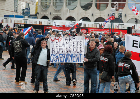 EDL members holding up banners for photographers. During the ...