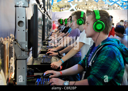 Teenagers playing computer games - LAN Party - network game Stock Photo ...