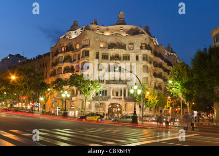 Casa Mila by Gaudi at twilight, laterne,Passeig de Gracia Stock Photo ...