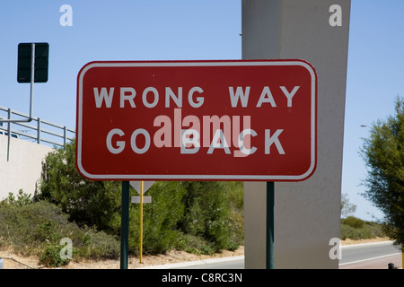 Wrong way,Go Back ! road sign , NSW Australia Stock Photo - Alamy