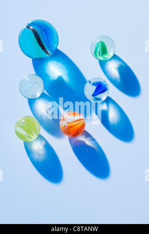 Marbles ball and its shadow Stock Photo - Alamy