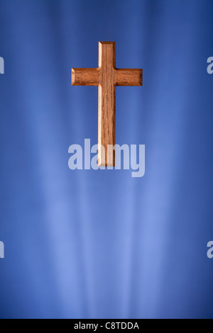 Cross religion symbol shape over sunset sky Stock Photo - Alamy