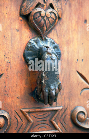 Old wooden door with wrought iron details in Gijon city, Asturias ...