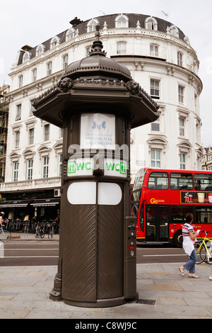 Public toilet WC coin operated pay to use in outdoor park Stock Photo ...