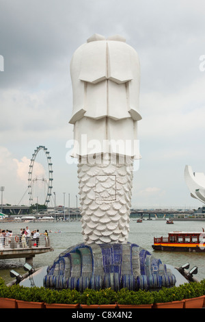 Merlion statue at Merlion Park in Singapore spouting water against a ...