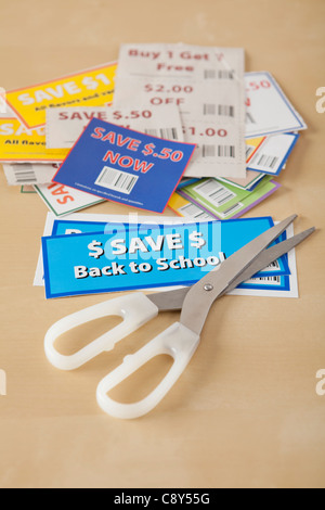 Coupons with Scissors Stock Photo - Alamy
