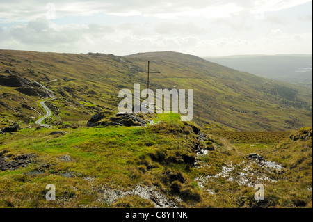 Priest's Leap, the cross, looking towards Coomhola mountain Stock Photo ...