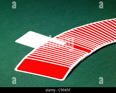 studio photography of spread out playing cards in a row with one chosen ...