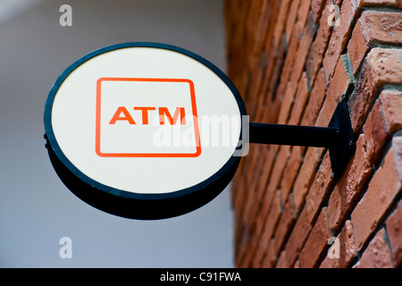 ATM sign on wall Stock Photo - Alamy