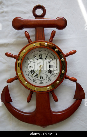 Clock ship's wheel Stock Photo - Alamy