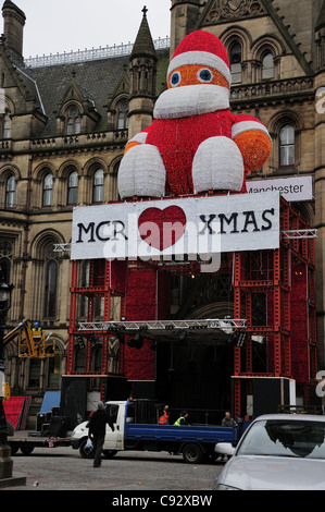 Christmas Santa being erected outside Manchester Town Hall Stock Photo ...