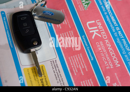 The new-look red V5C form, the UK vehicle registration certificate log book, introduced to ...