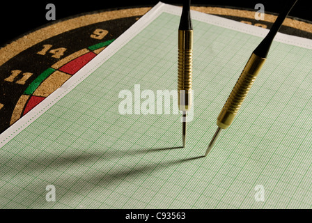 Darts on a graph paper Stock Photo - Alamy