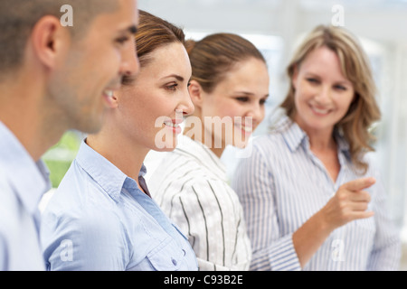Group of business people working as team in office Stock Photo - Alamy