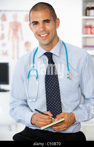 male doctor writing prescription Stock Photo - Alamy