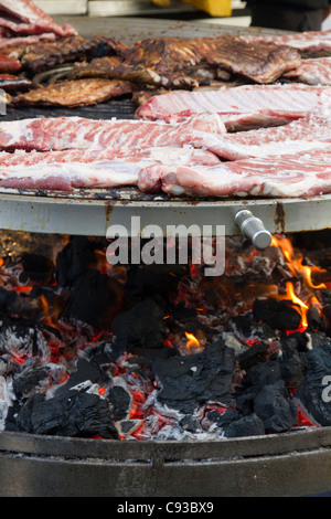 "Asado a la parrilla" grilled meat in a construction site, Argentine ...