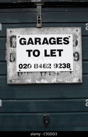 garages to let sign, on a garage door in mortlake, southwest london ...
