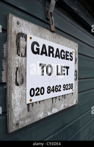 garages to let sign, on a garage door in mortlake, southwest london ...