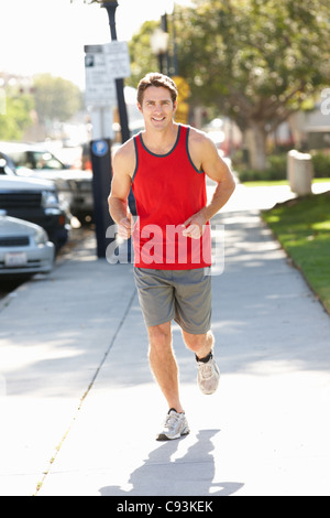 Running in the city Stock Photo - Alamy