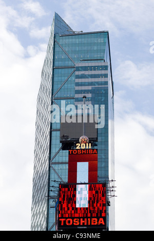 New Year's glass ball with the flag of Karelia against a colorful ...