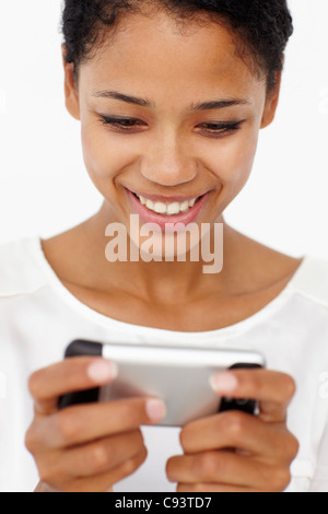 Young woman with mobile phone in the office Stock Photo - Alamy