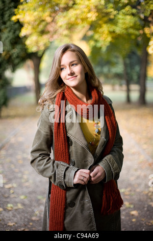 Beautiful girl in a park. Stylish girl in a sport clothes Stock Photo ...