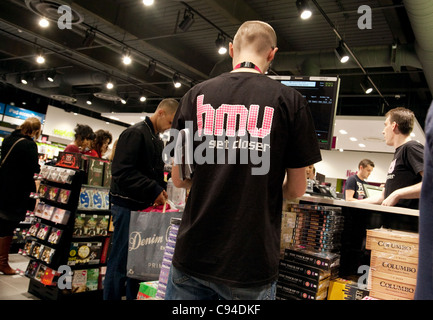 Staff in HMV store interior with DVD DVDs, UK Stock Photo - Alamy