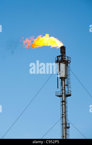 Flaring off gas at the Flotta oil terminal on the Island of Flotta in ...