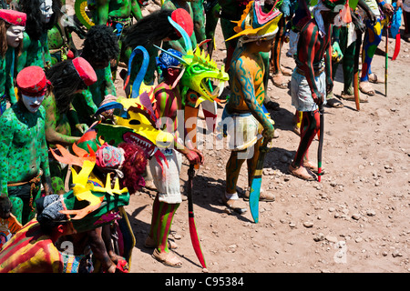 Cora Indians, wearing colorful masks, dance during the religious ritual ...