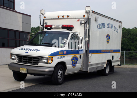 Law enforcement investigate the scene where a vehicle rammed into a ...