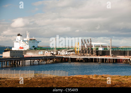 An oil tanker loading with crude oil at the Flotta oil terminal in the ...