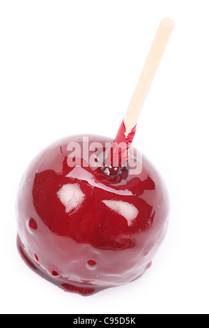 Red Taffy Apple with white background Stock Photo - Alamy