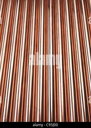 Shiny plumbing copper tubes abstract artistic background Stock Photo ...