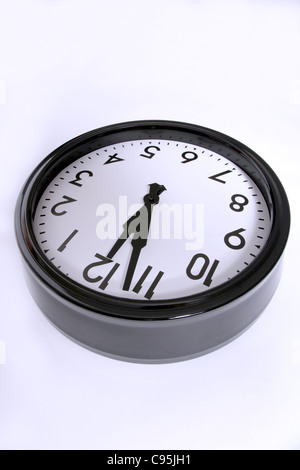 Upside down clock at just before 12 Stock Photo - Alamy