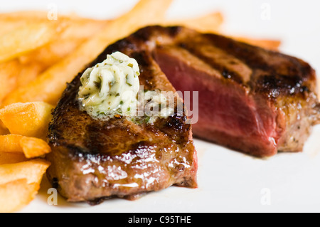 Wild boar steak with herb butter Stock Photo - Alamy