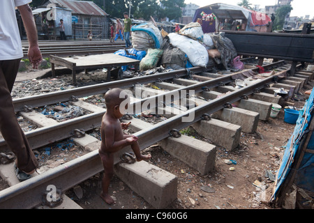 Life in Tejgaon slum in Dhaka. The slum is build along the train lines ...