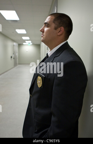 Male security guard in building Stock Photo - Alamy