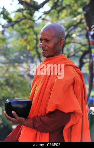 Buddhism monk accepting donation Stock Photo - Alamy